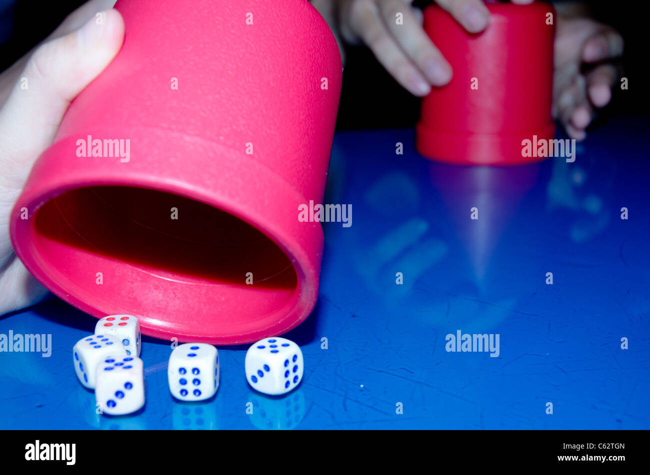 play dice gamble Stock Photo - Alamy