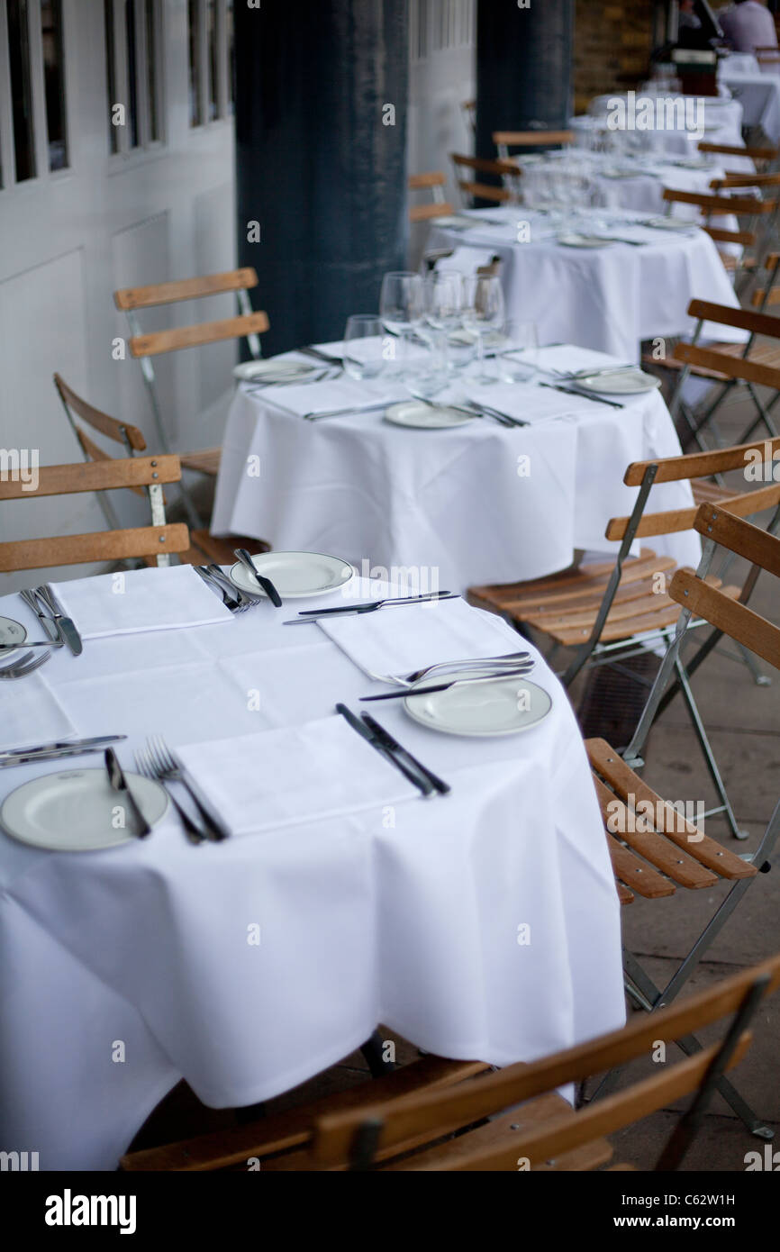 Tables outside a London restaurant Stock Photo - Alamy