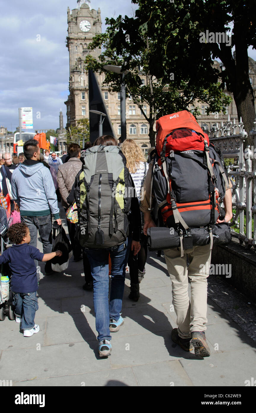 Backpackers walking on Princes Street Edinburgh Scotland UK Stock Photo ...