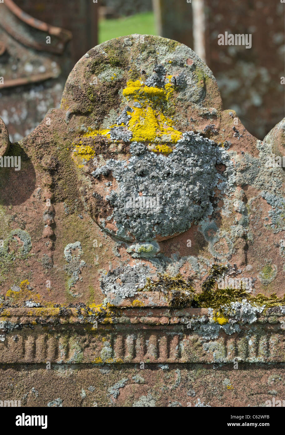 Detail of eroded gravestone with urn design. Church of Saint Lawrence ...