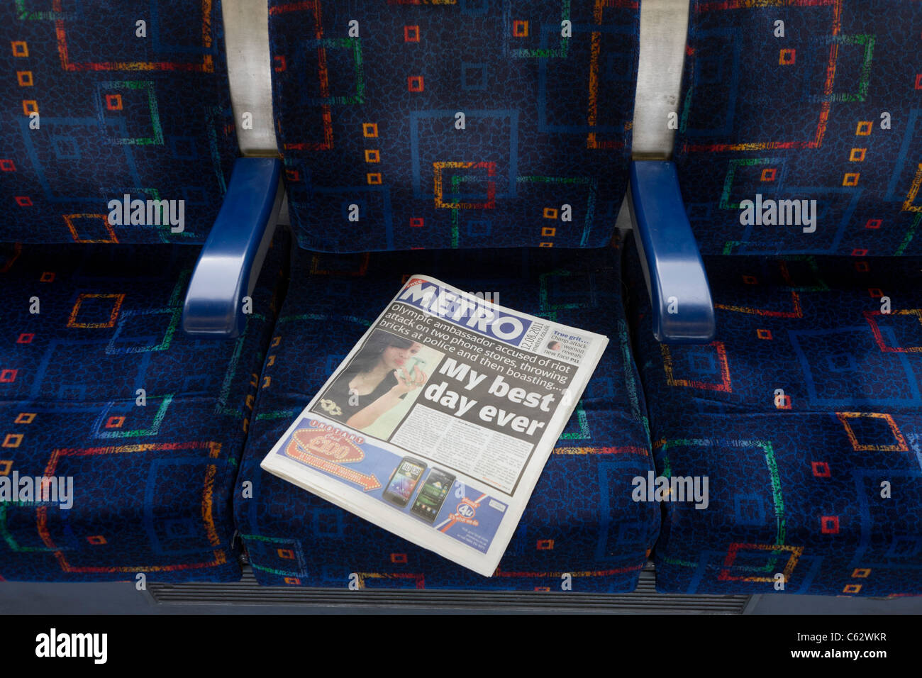Metro newspaper on a London underground tube train seat with Olympic ...