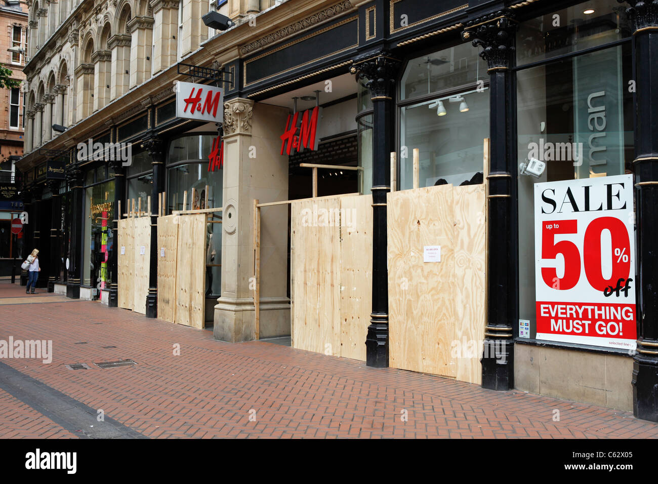 Boarded up shop windows in New Street Birmingham after the riots in ...