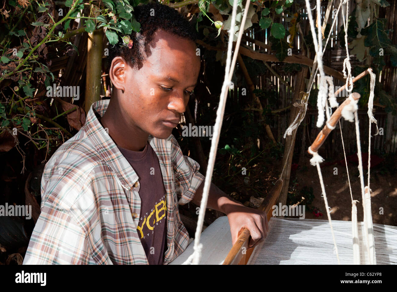A Dorze tribesman weaving cotton at the village of Chencha near Arba ...