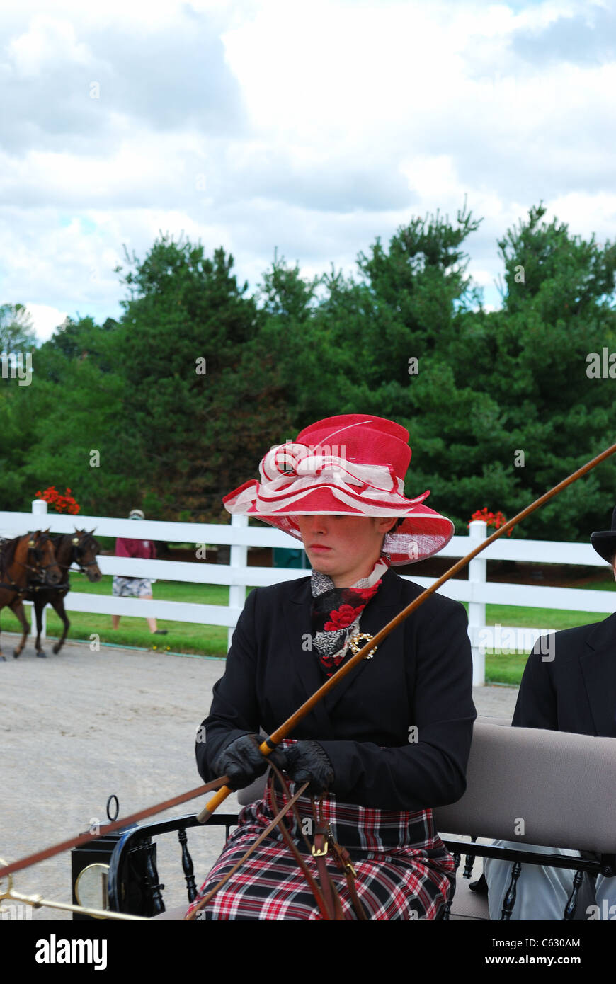 Carriage driver and passenger at Walnut Hill Farms annual carriage ...