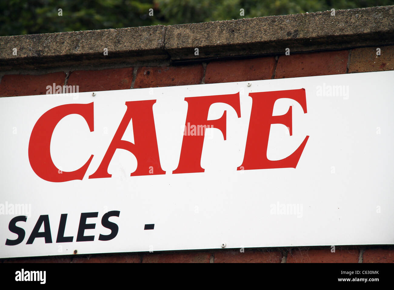 Café sign on a wall close up Stock Photo - Alamy