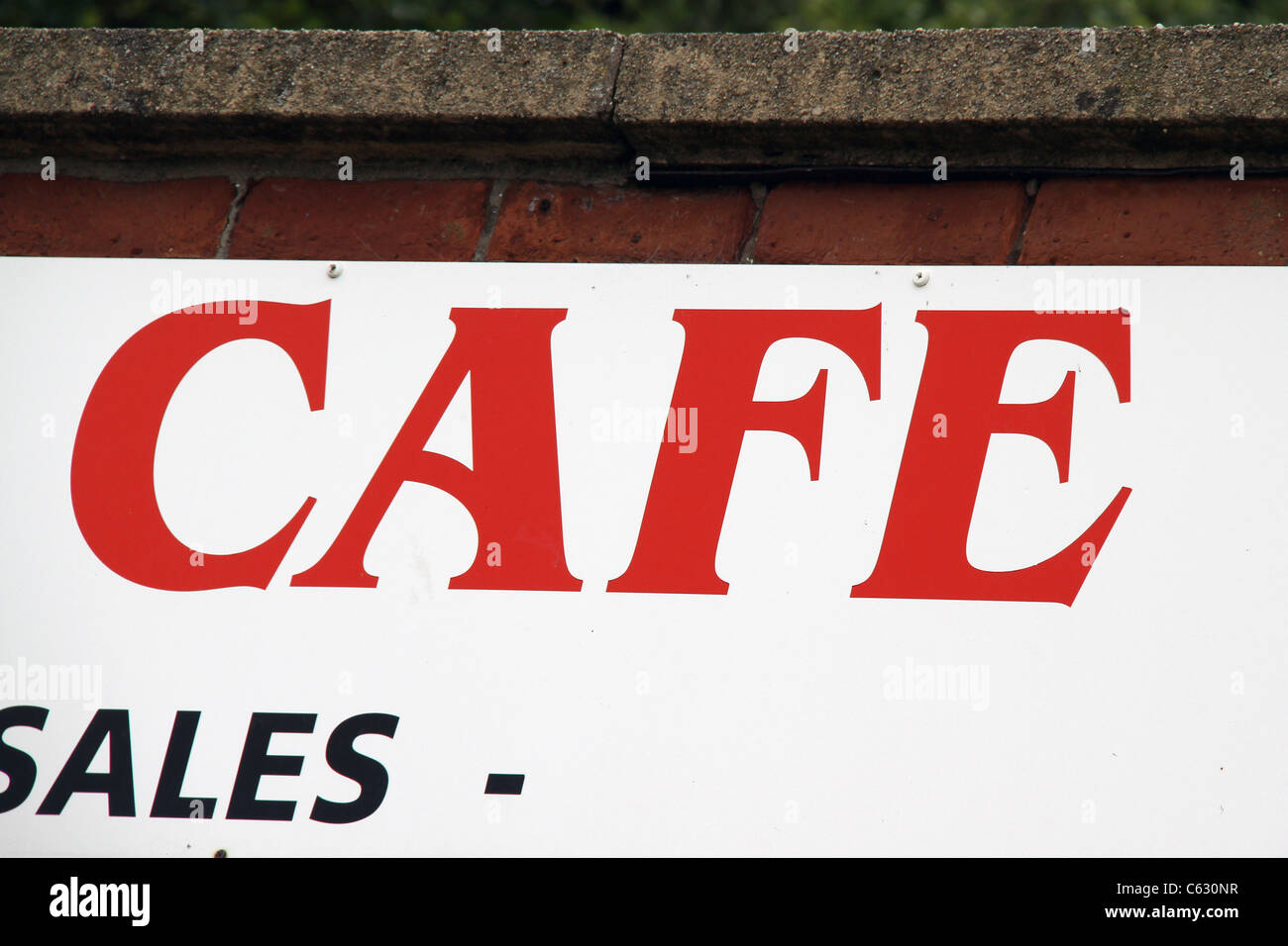 Café sign on a wall close up Stock Photo - Alamy