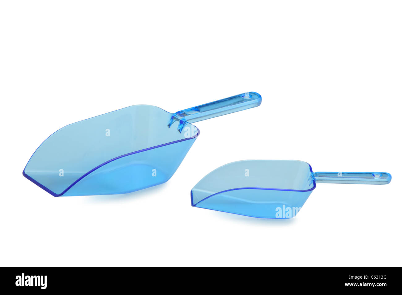 Scoops for food stuffs. Transparent, blue color Stock Photo - Alamy