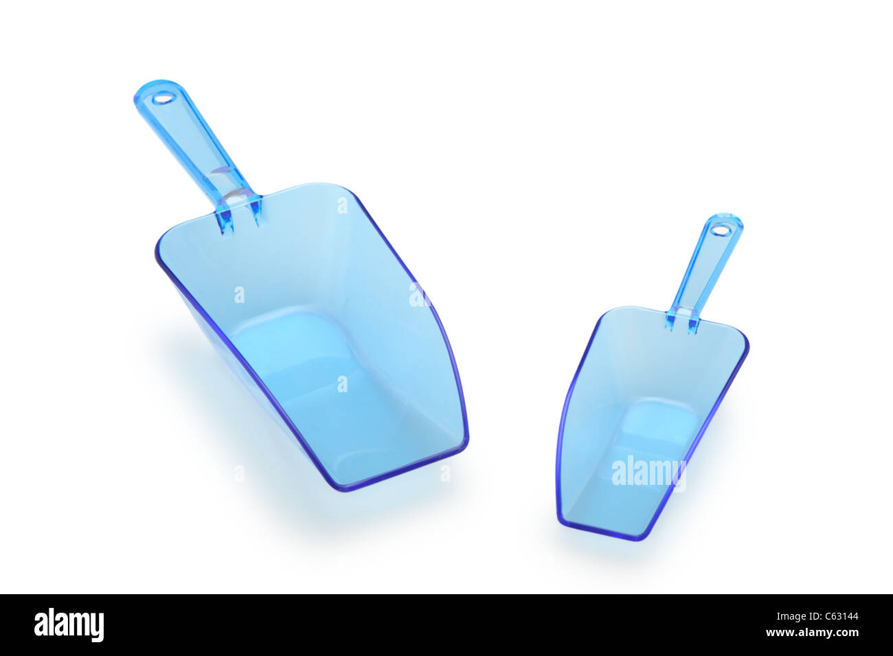 Scoops for food stuffs. Transparent, blue color Stock Photo - Alamy