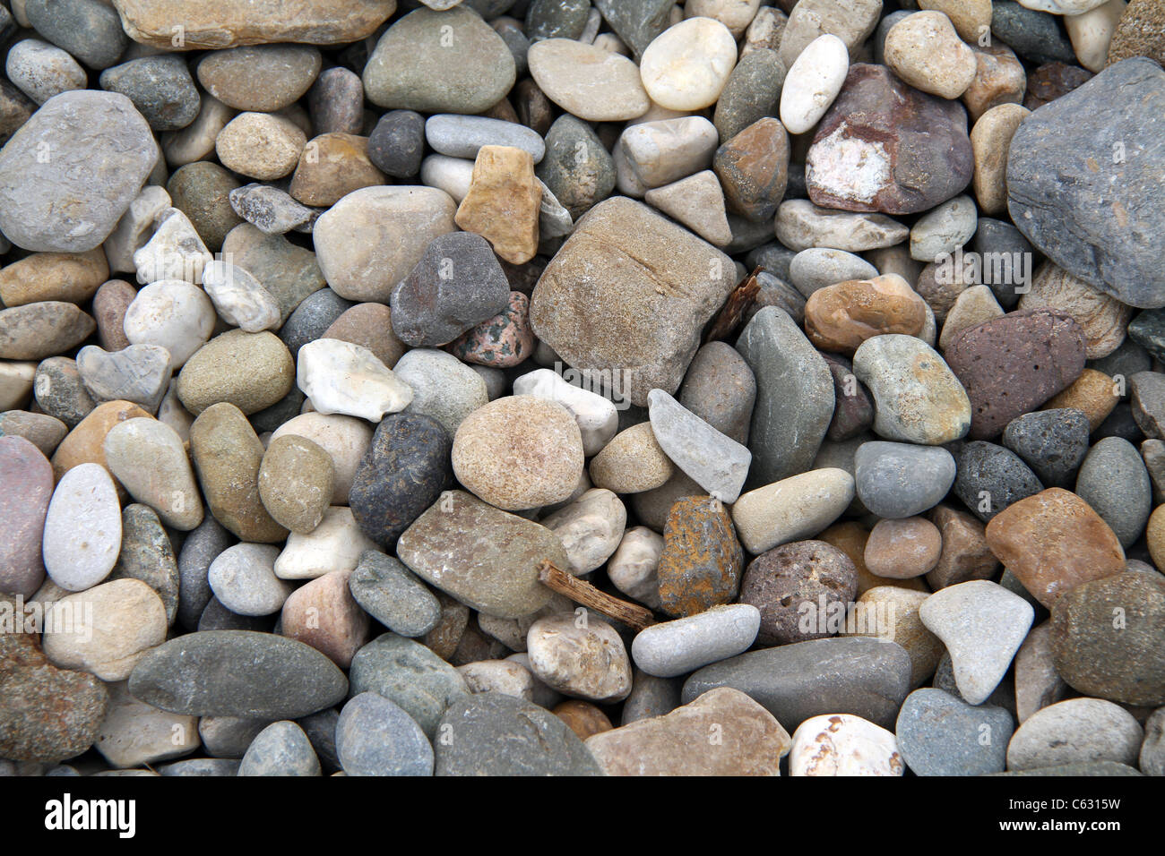 Pebble Background textured granite pebbles close up Stock Photo - Alamy