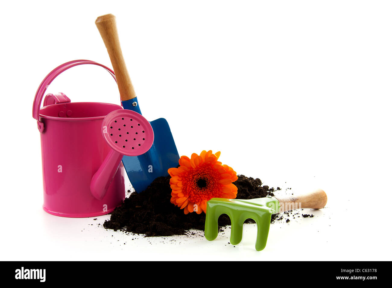 Colorful gardening tools and black soil over white background Stock ...
