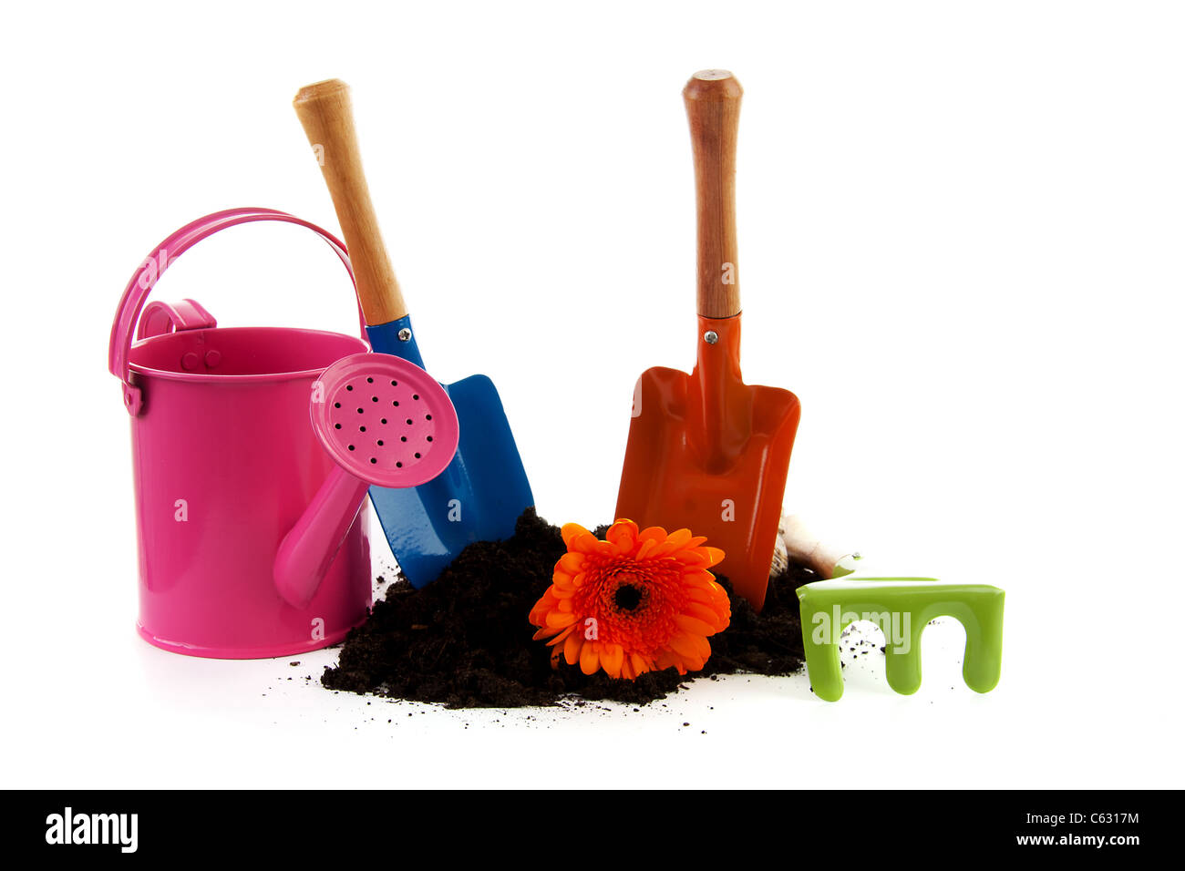 Colorful gardening tools and black soil over white background Stock ...