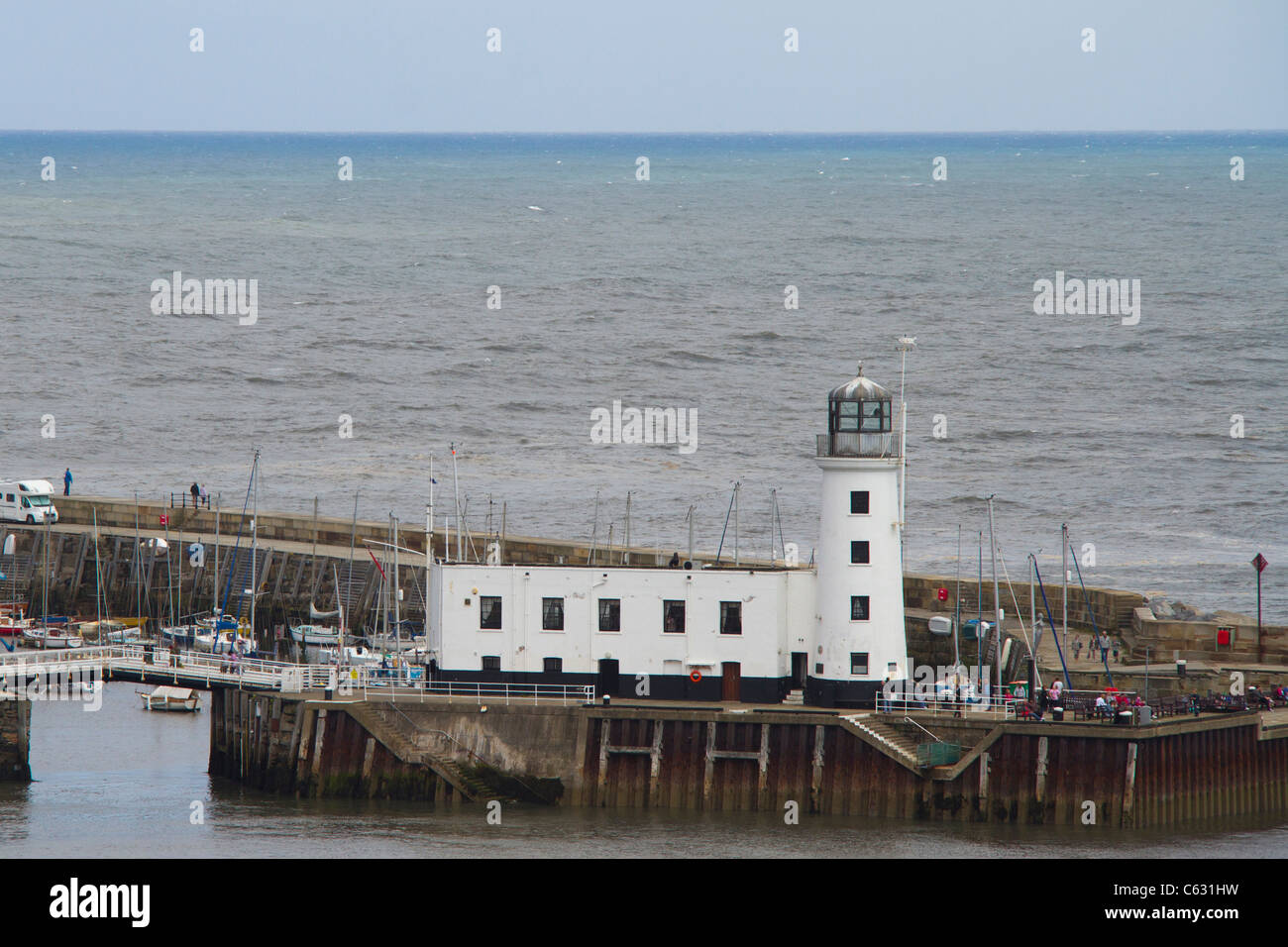 Scarborough Lighthouse on the coastline of Yorkshire England Stock ...