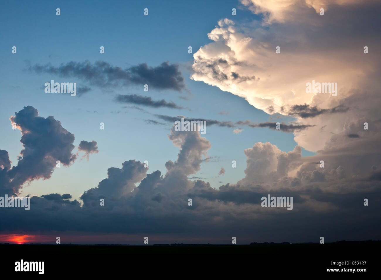 Thunderstorm at Sunset Stock Photo - Alamy