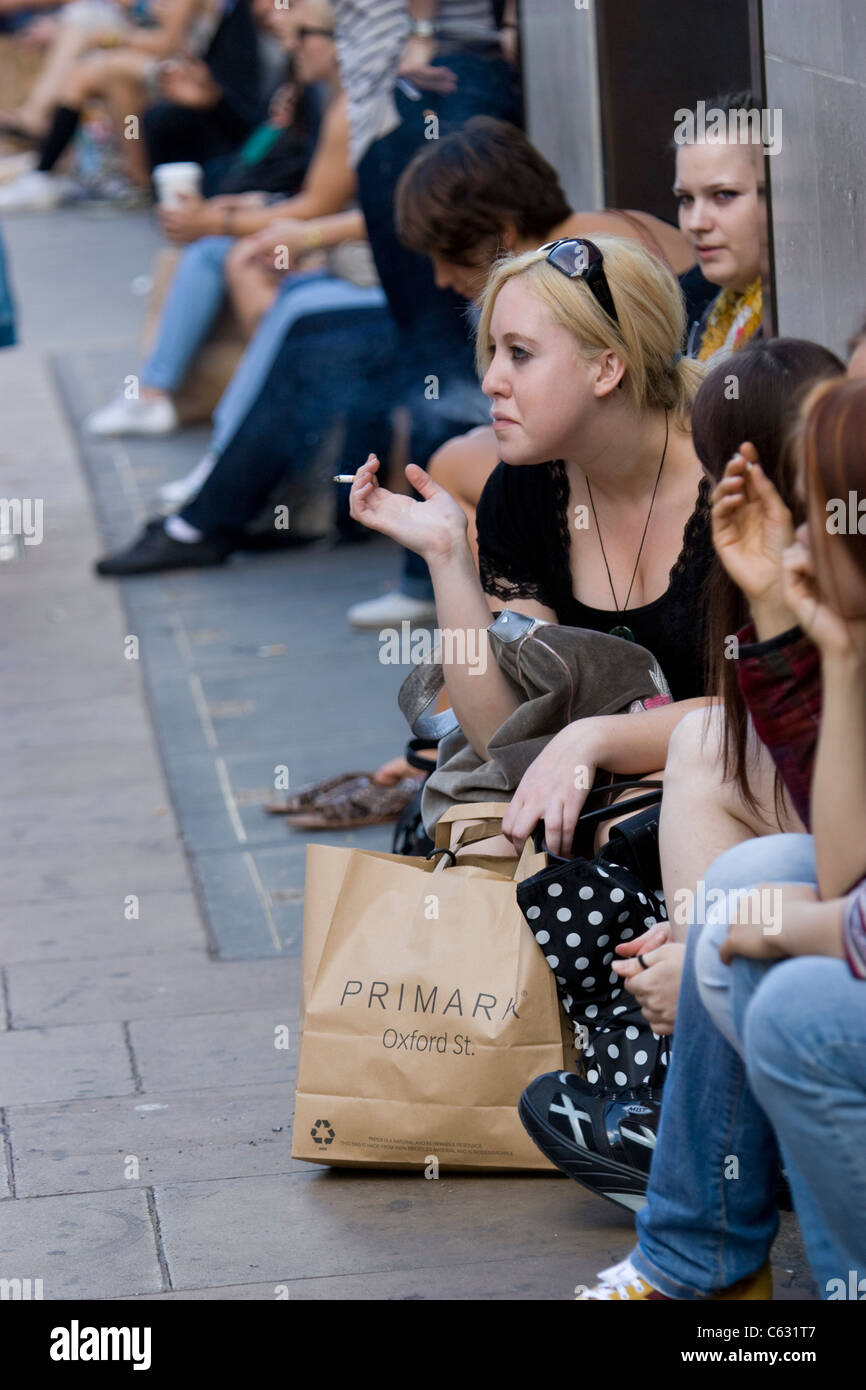 Primark shoppers gather outside the Oxford Street store in London ...