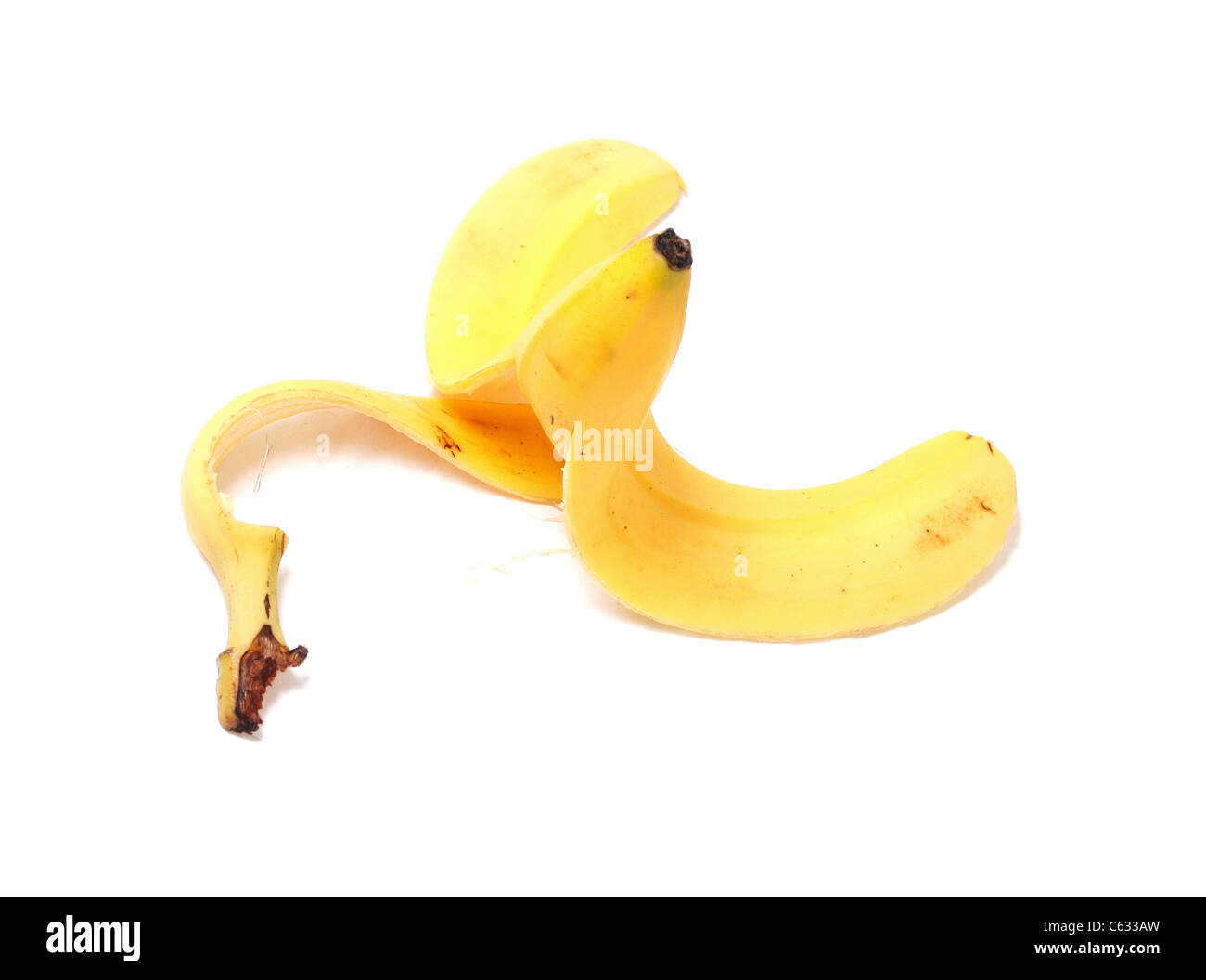 A banana peel on the ground Stock Photo - Alamy