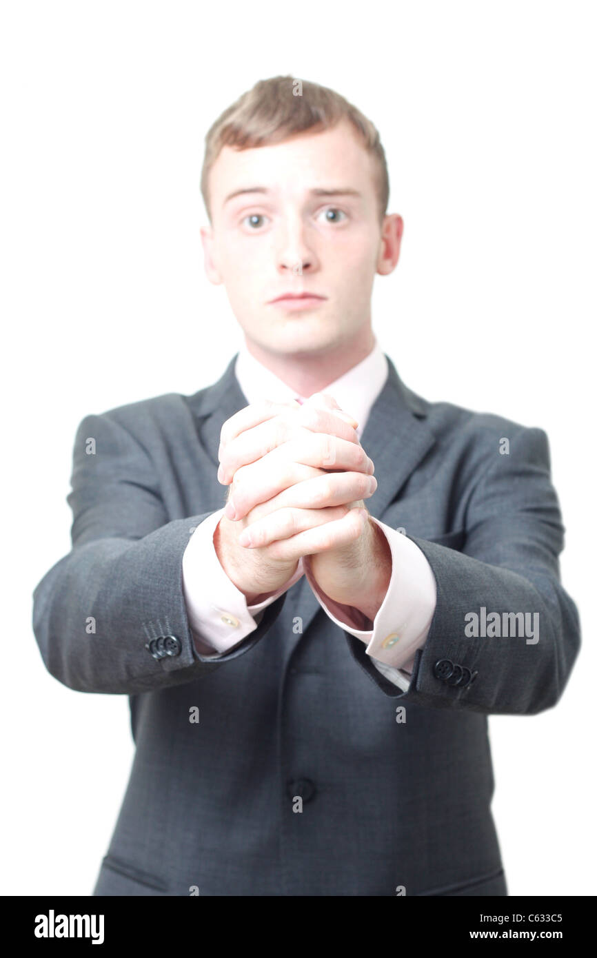 A business man begging for money on white Stock Photo - Alamy