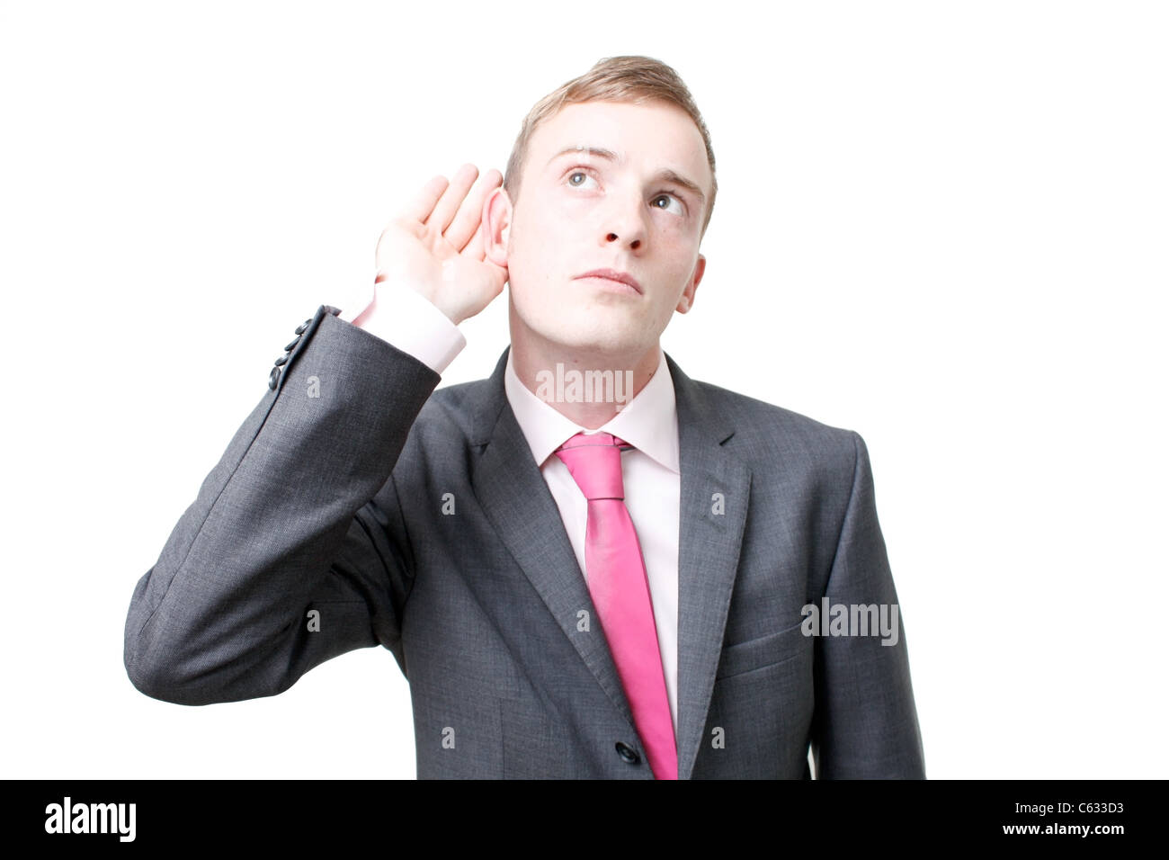 A business man listening isolated on white Stock Photo - Alamy
