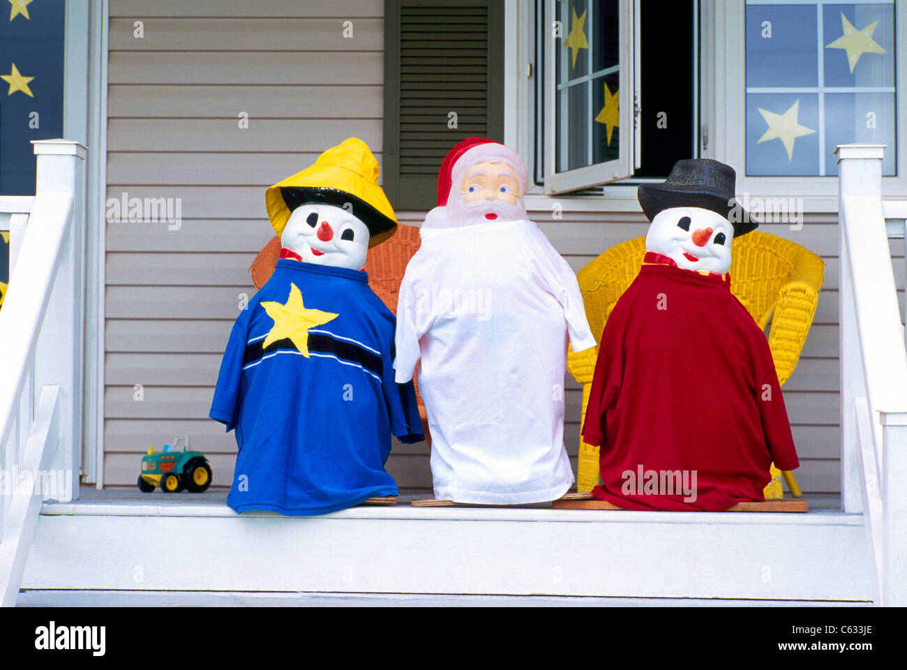 Figures dressed in Blue, White, and Red (Acadian Flag Colours) for ...