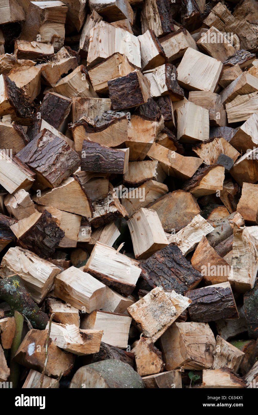 log pile split wood logs for fire wood Stock Photo - Alamy