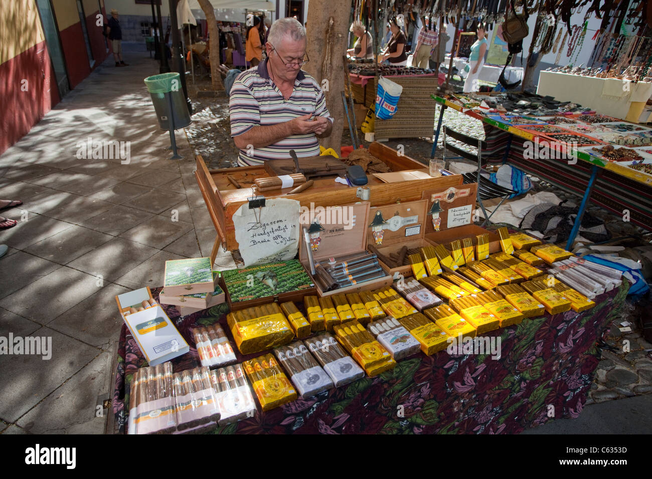 Old man rolling cigars at the market of Santa Cruz, La Palma, Canary ...