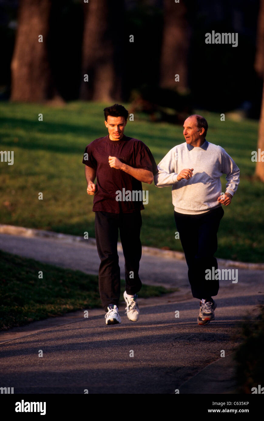 Father and son out for a fitness run Stock Photo - Alamy