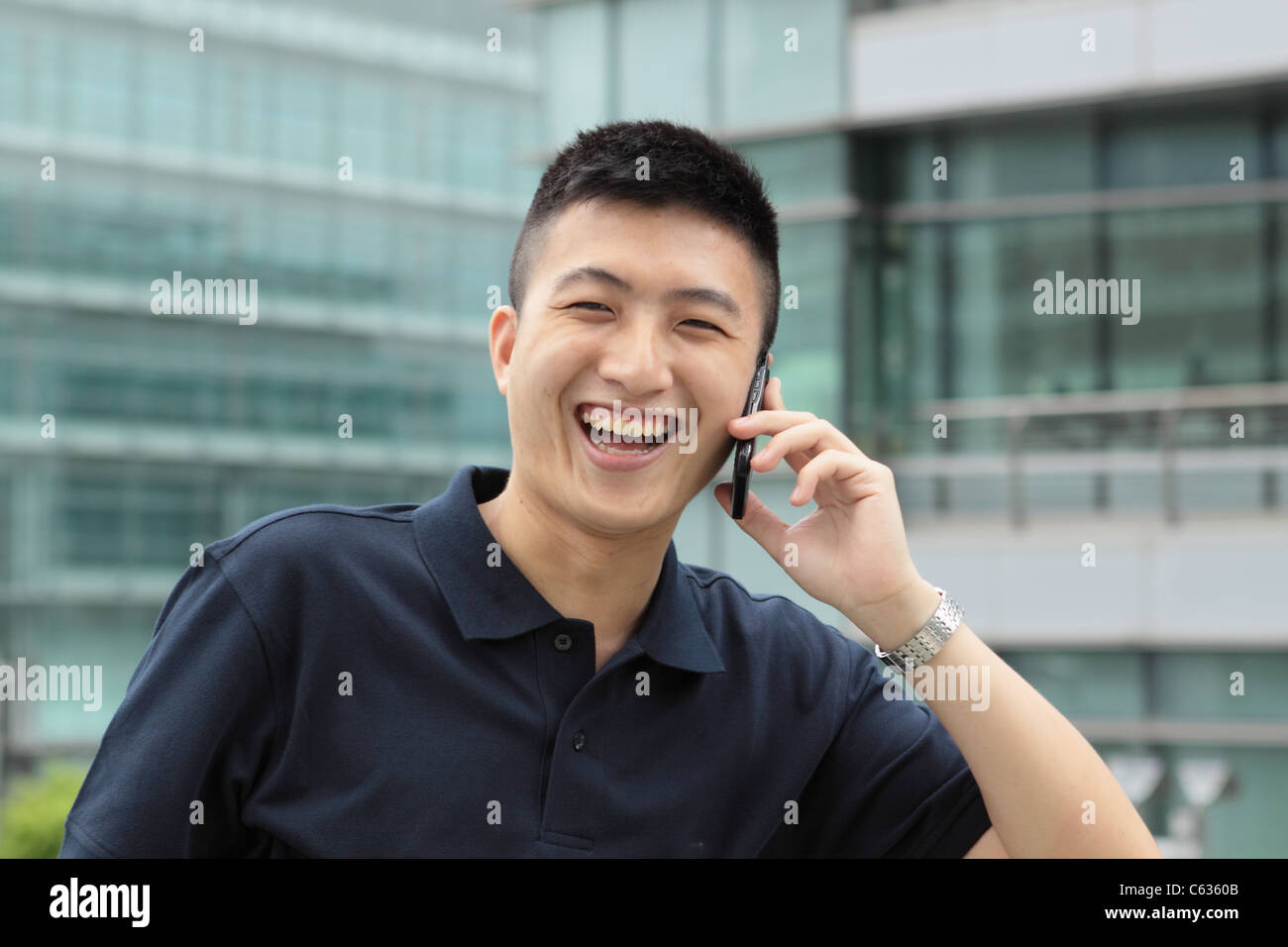 man on phone and smile Stock Photo - Alamy