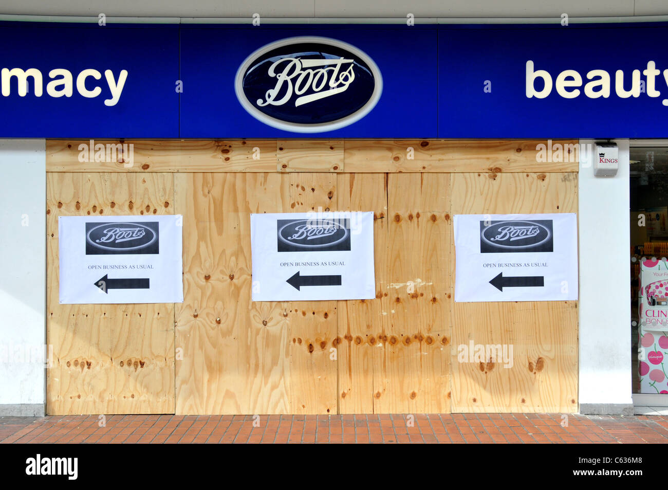 Boots Wood Green London Riots looted shops boarded up smashed windows ...