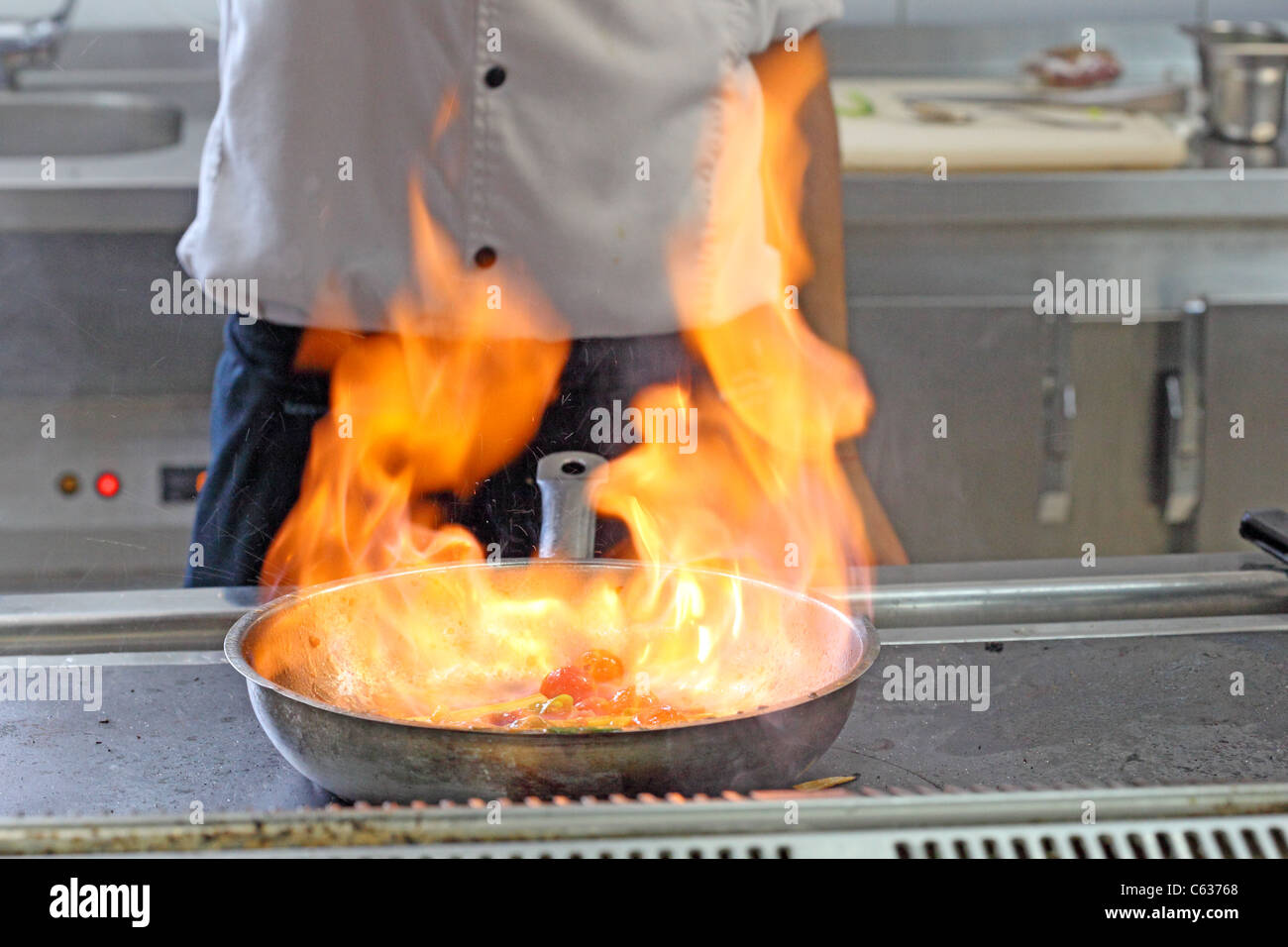 fire chef cook cooking Stock Photo - Alamy