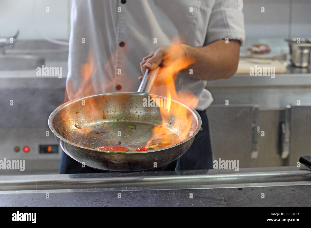fire chef cook cooking Stock Photo - Alamy