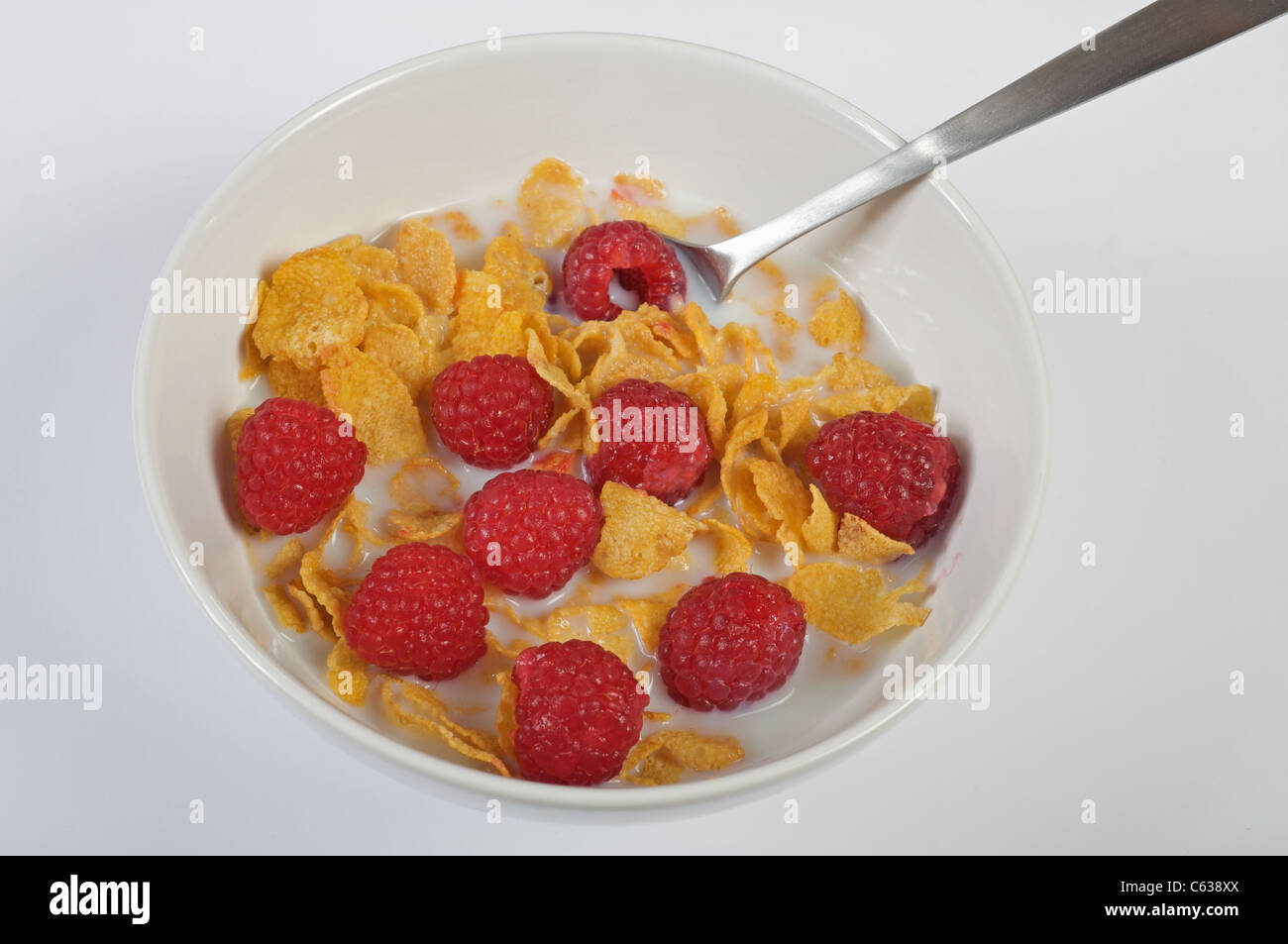Cornflakes with fresh raspberries Stock Photo - Alamy