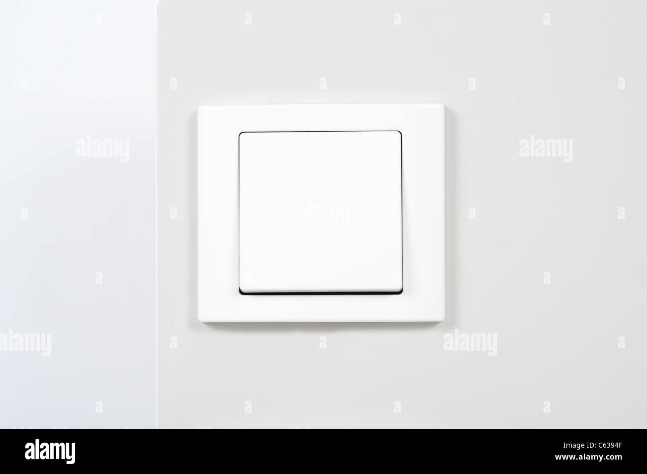 white light switch on the wall Stock Photo - Alamy