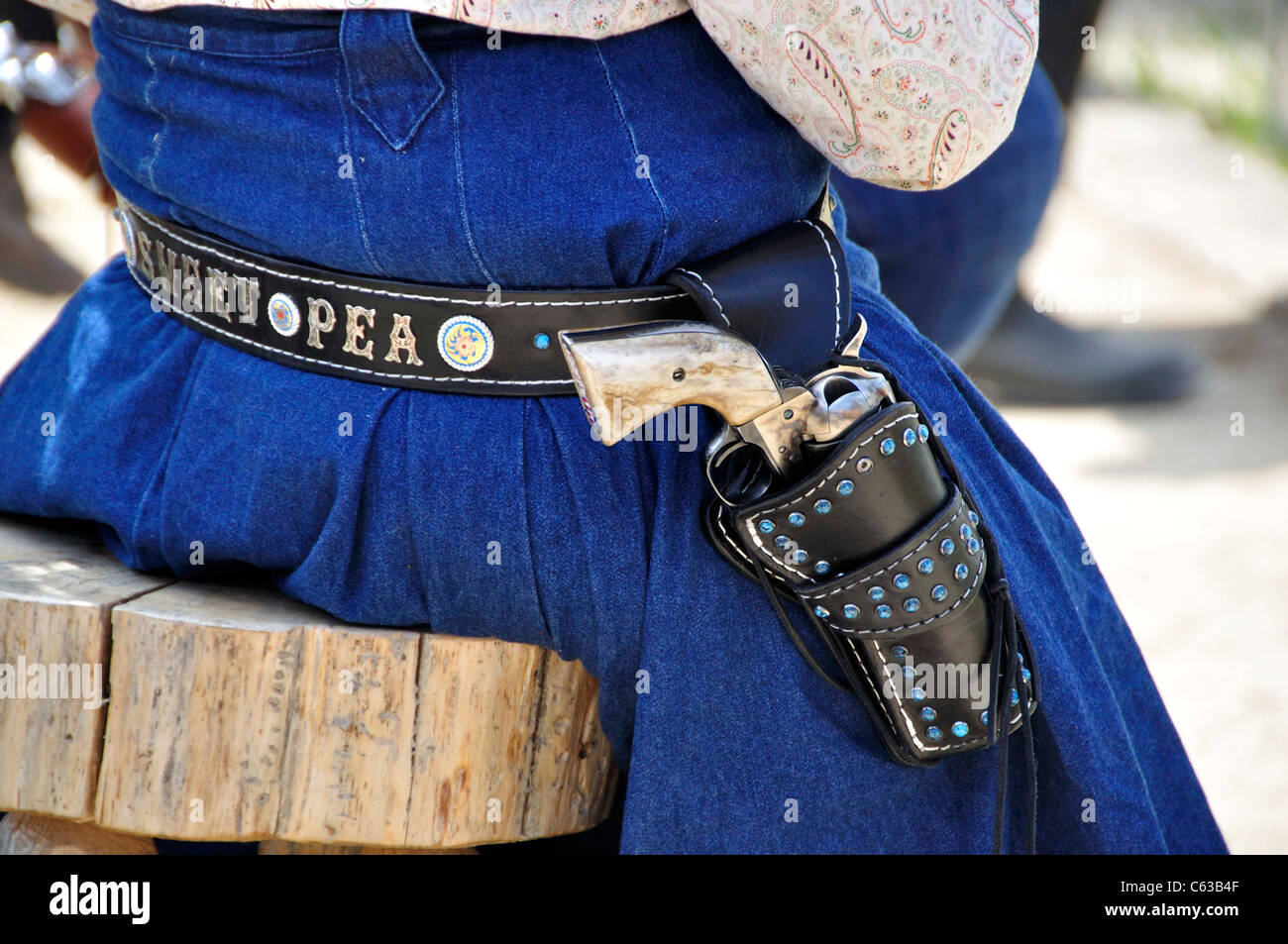 Woman wearing a Colt .45 at a fast draw competition Stock Photo - Alamy