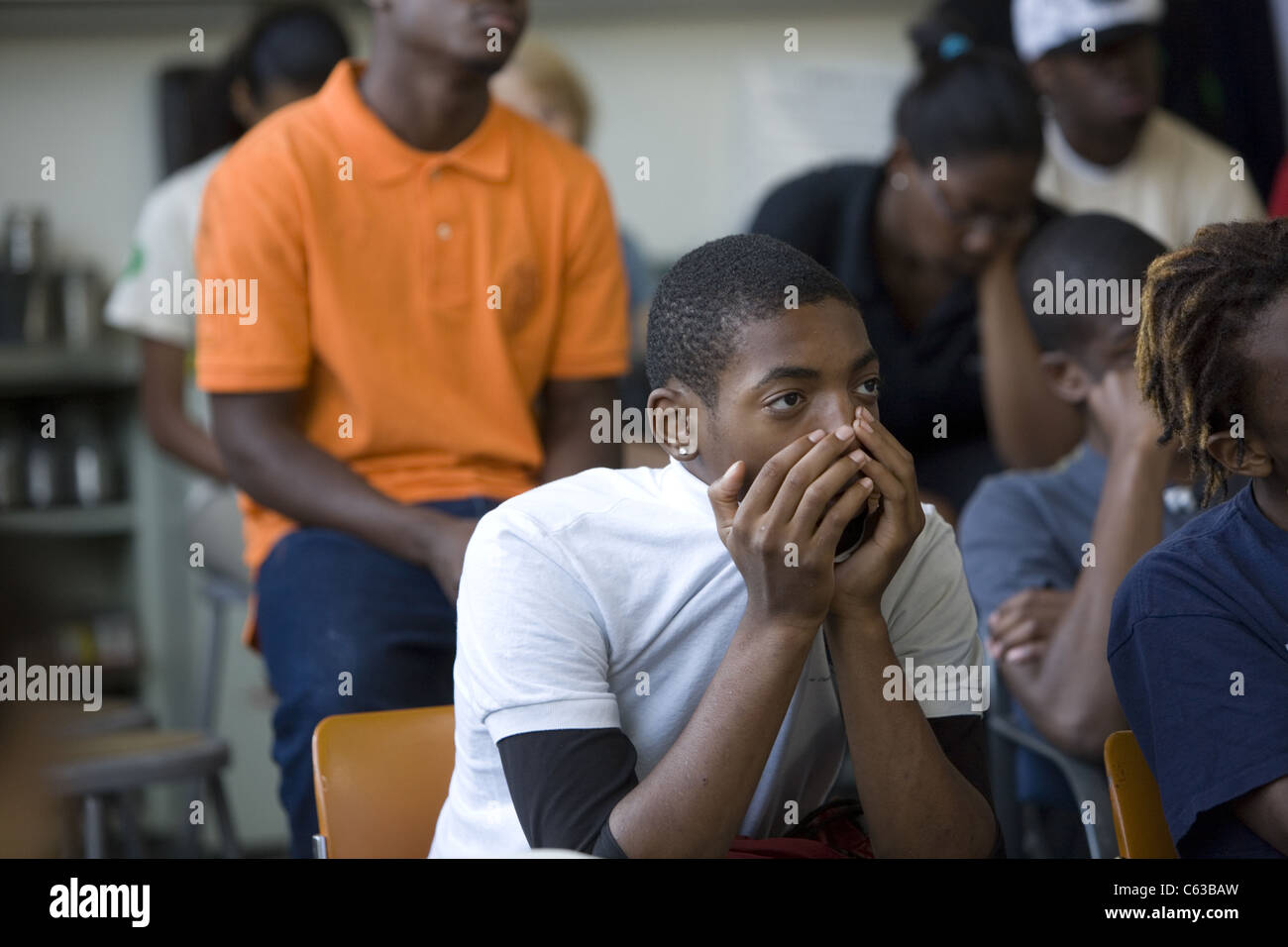 Students from the Detroit Community School participate in a ...