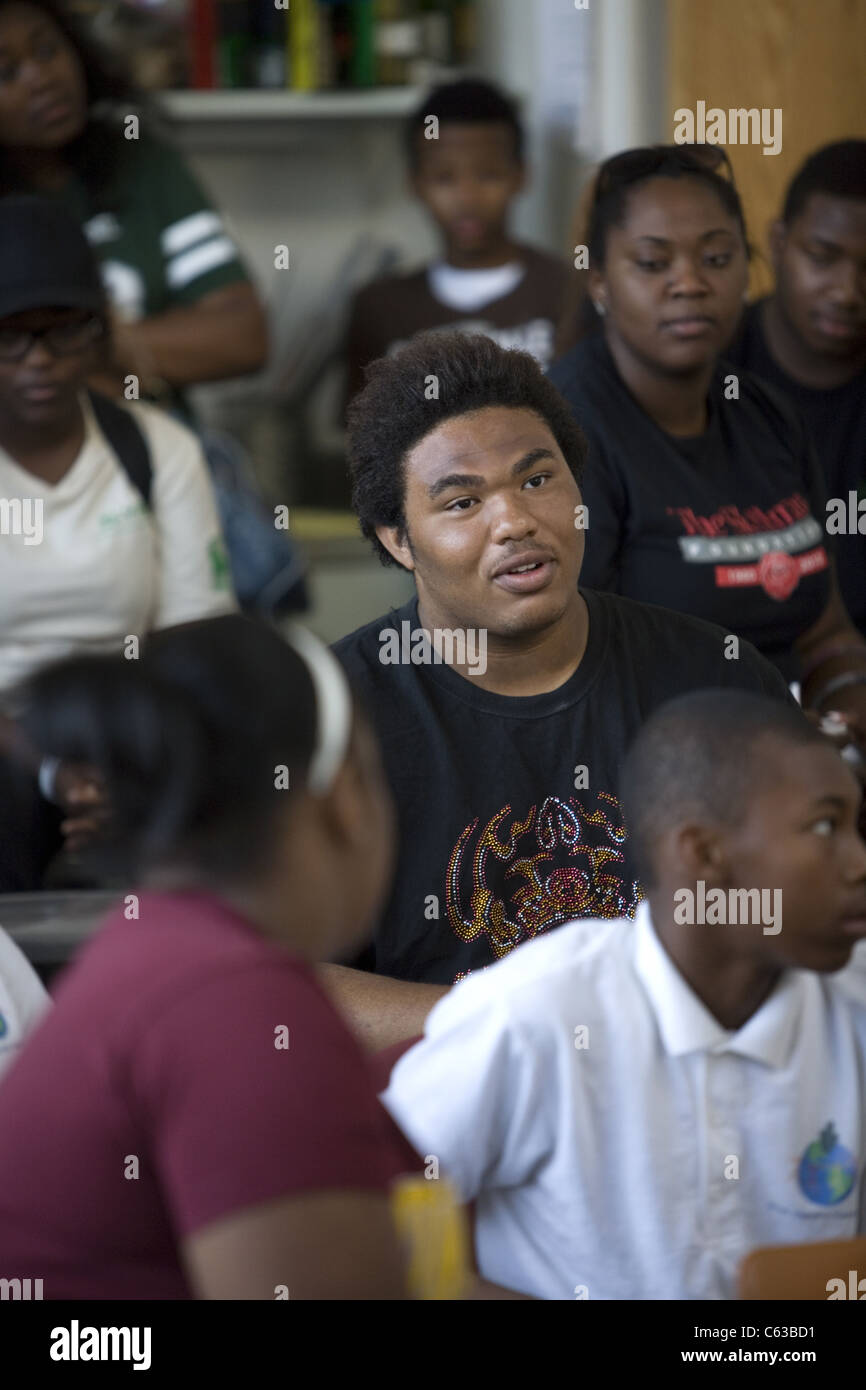 Students from the Detroit Community School participate in a ...