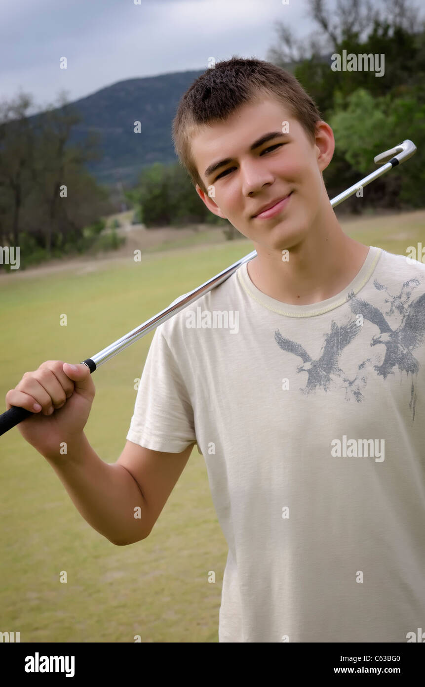 Teenage golf player Stock Photo - Alamy