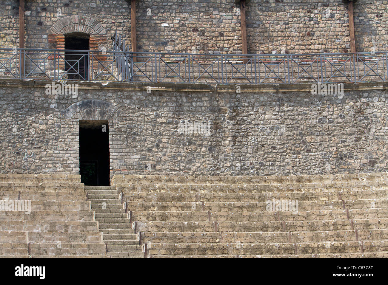 Steps and stairs rock of the theater in Pompeii, Italy. Balcony seating ...