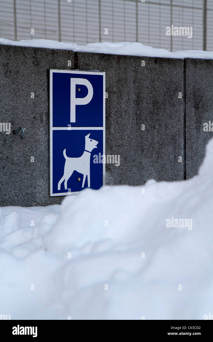 Heavy snow covers a dog park in Finland. It is February and the weather ...