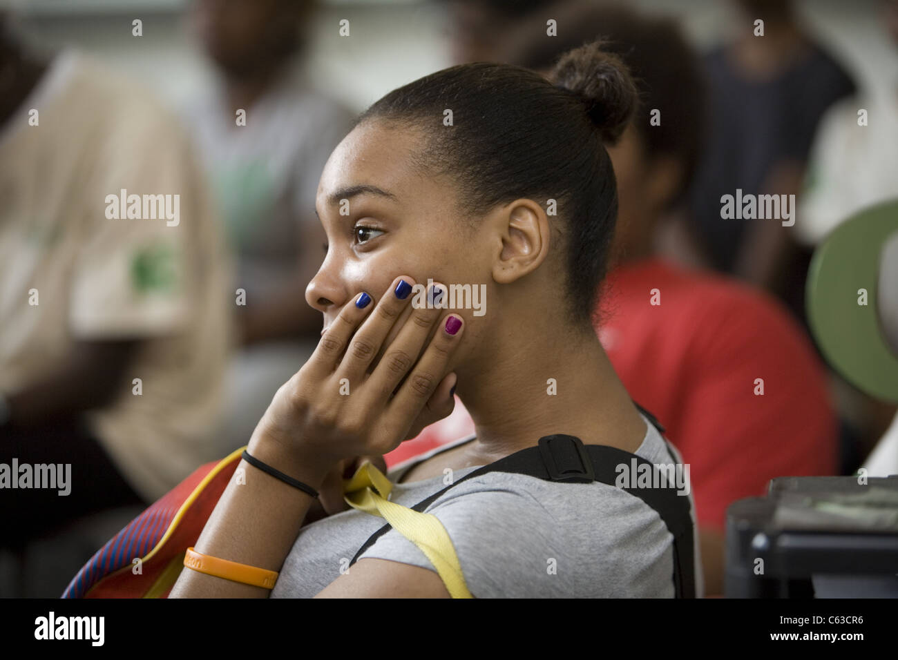 Students from the Detroit Community School participate in a ...