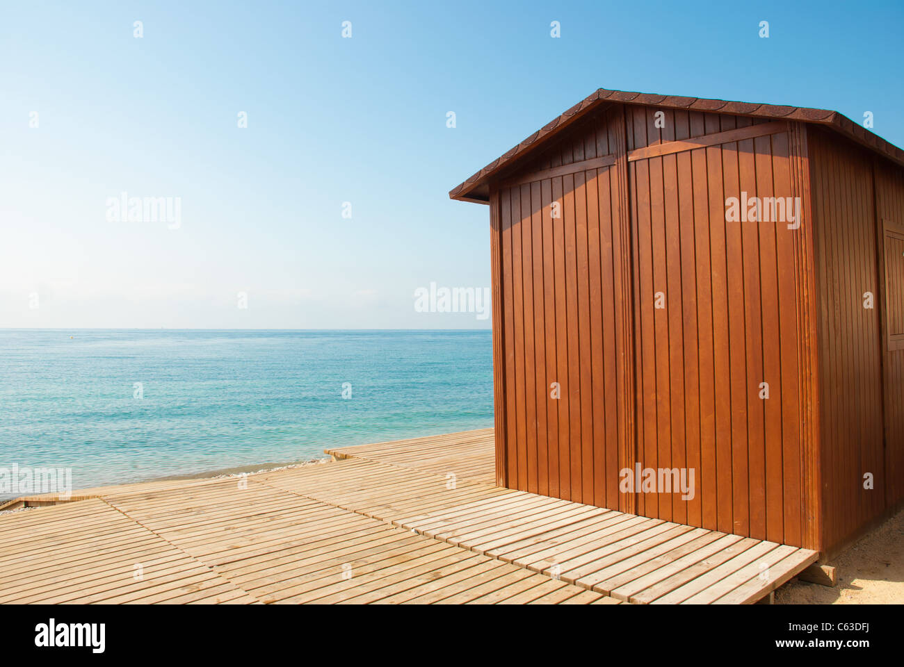 A wooden beach hut on a sunny Mediterranean day Stock Photo - Alamy