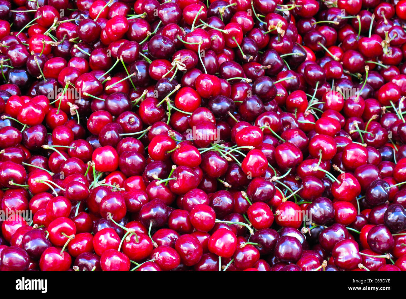 Cherries displayed at a market in Paris Stock Photo - Alamy