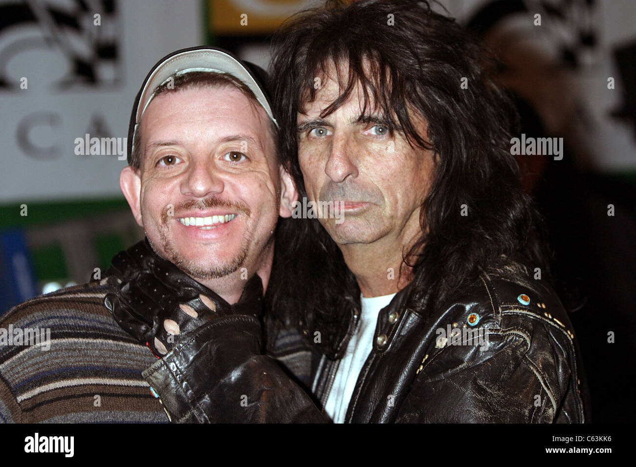 Rock legend Alice Cooper choke holds a member of NewMarket Films' staff ...