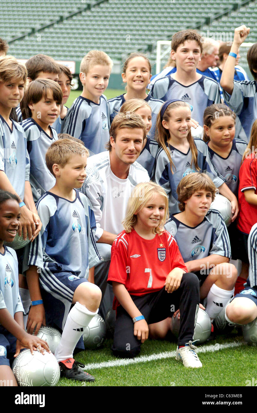 David Beckham with young soccer players at the press conference for ...