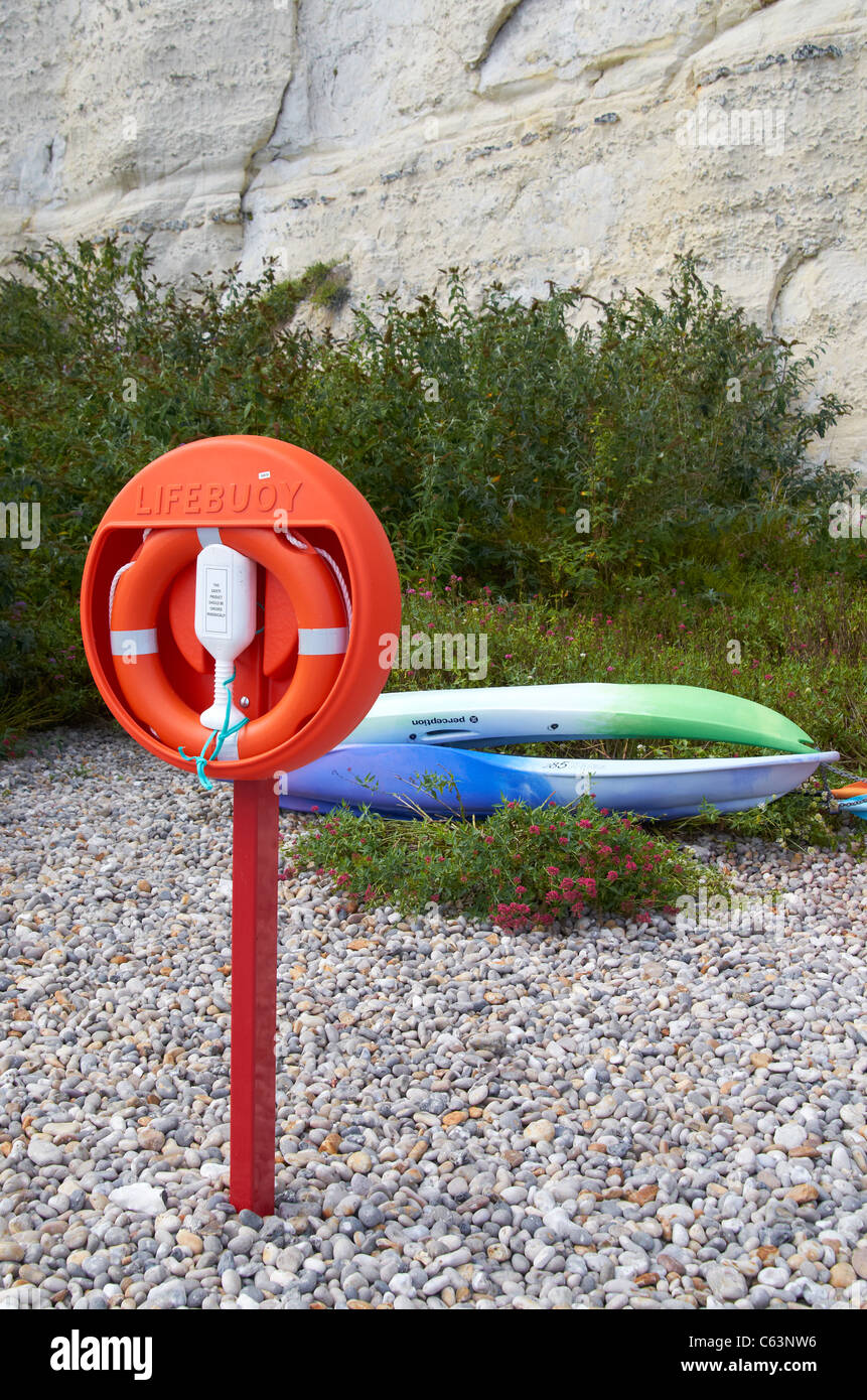 Life belt and rope installed on the beach at Beer, Devon, England with ...