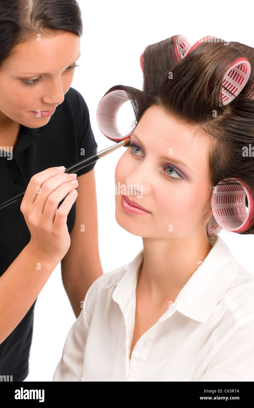 Make-up artist woman fashion model apply eyeshadow with brush Stock ...