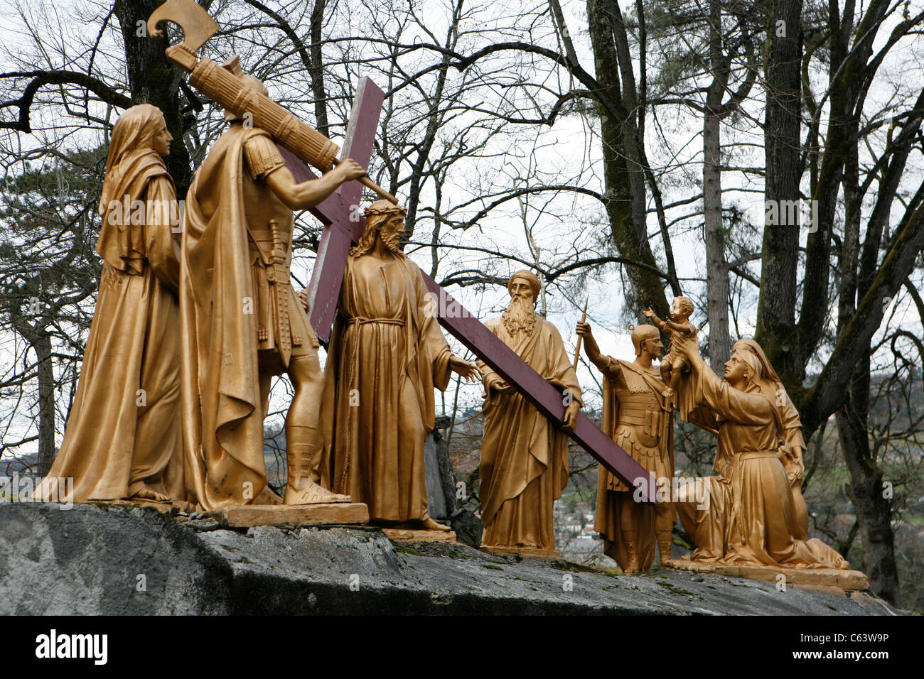 Lourdes in winter: Jesus Christ with the cross, crucifixion, Maria, The ...