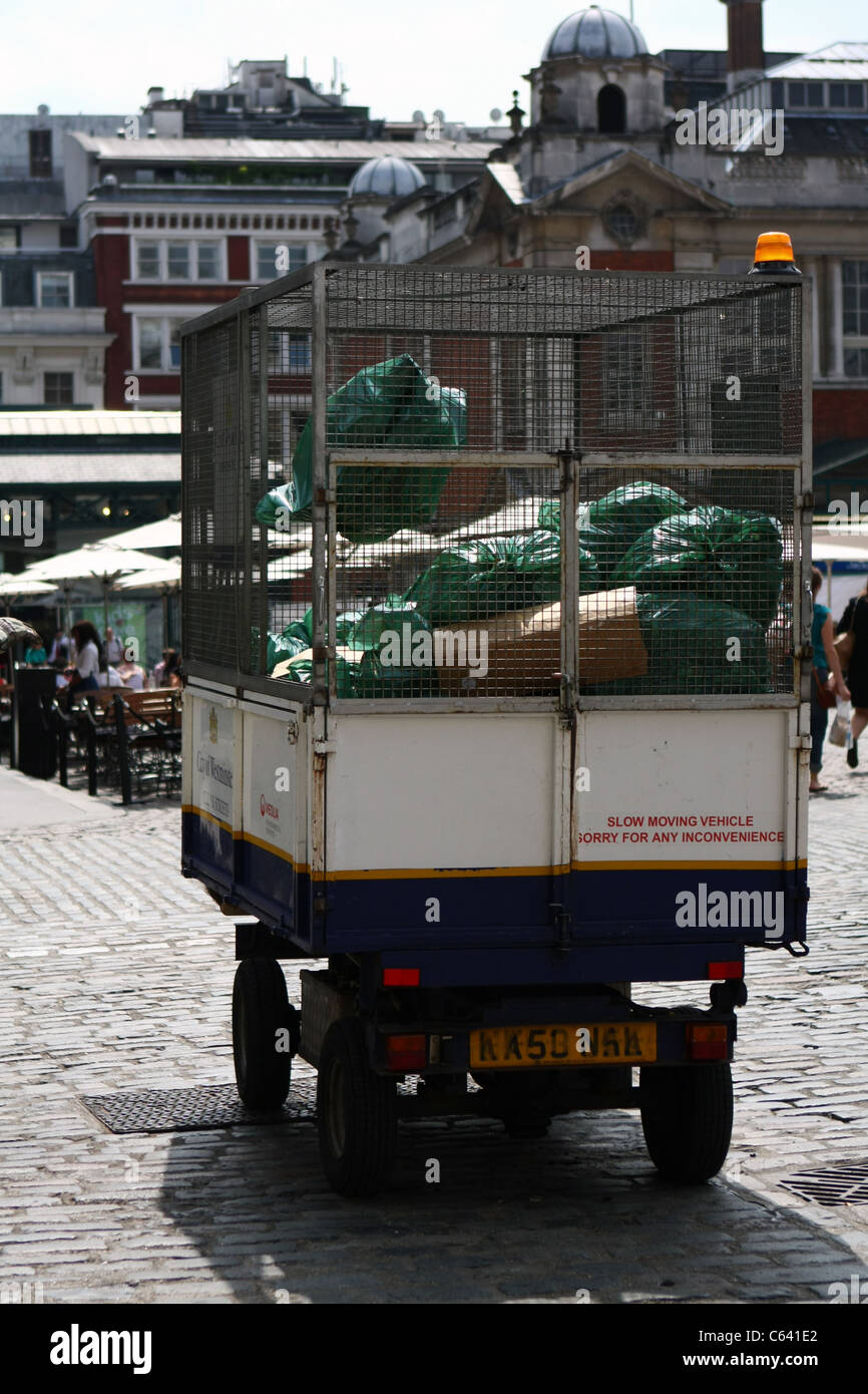 Hand pulled rubbish cart hi-res stock photography and images - Alamy
