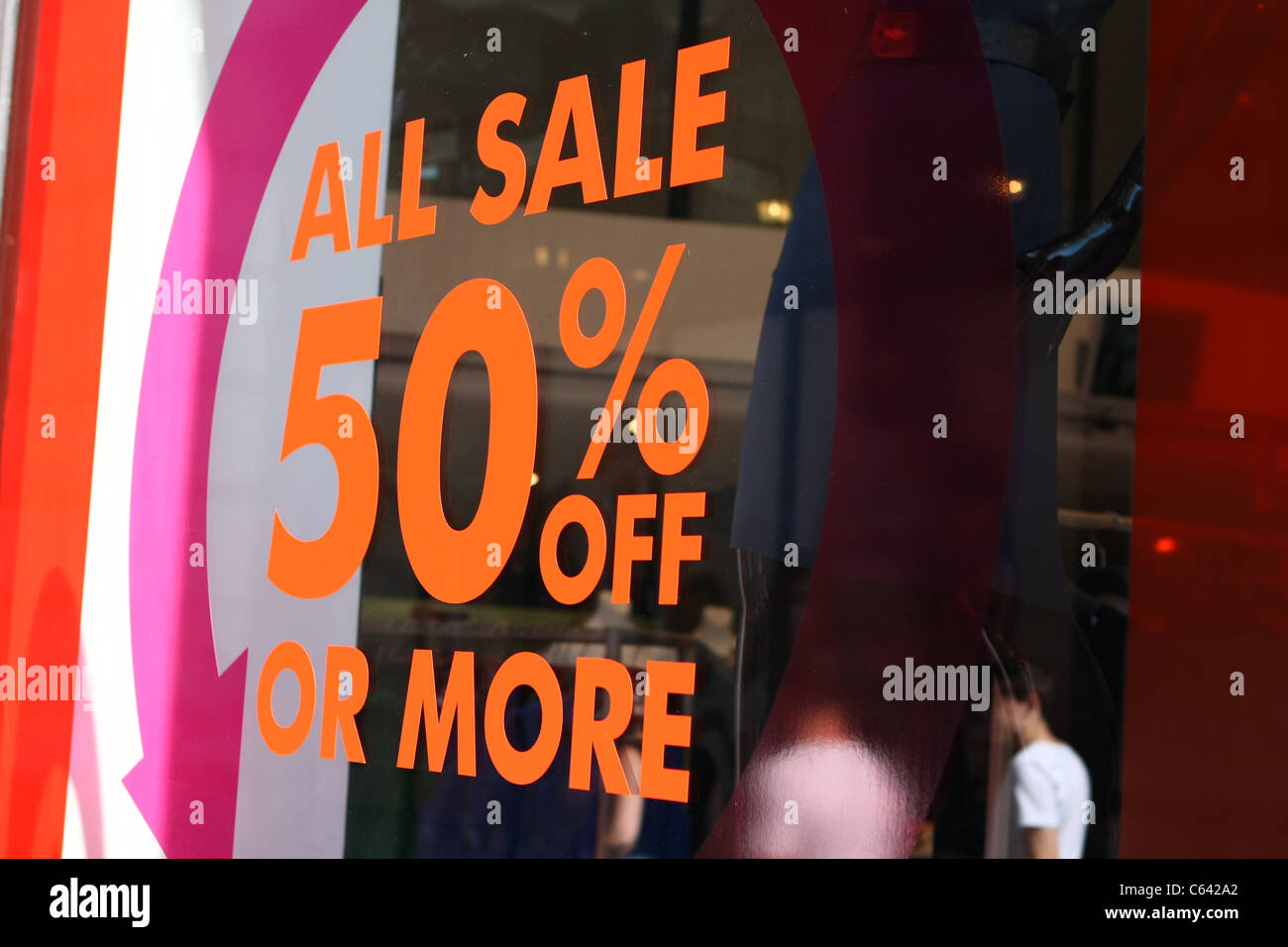 a sale sign in a shop window Stock Photo - Alamy