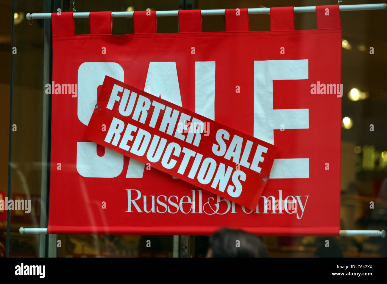 a sale sign in a shop window Stock Photo - Alamy