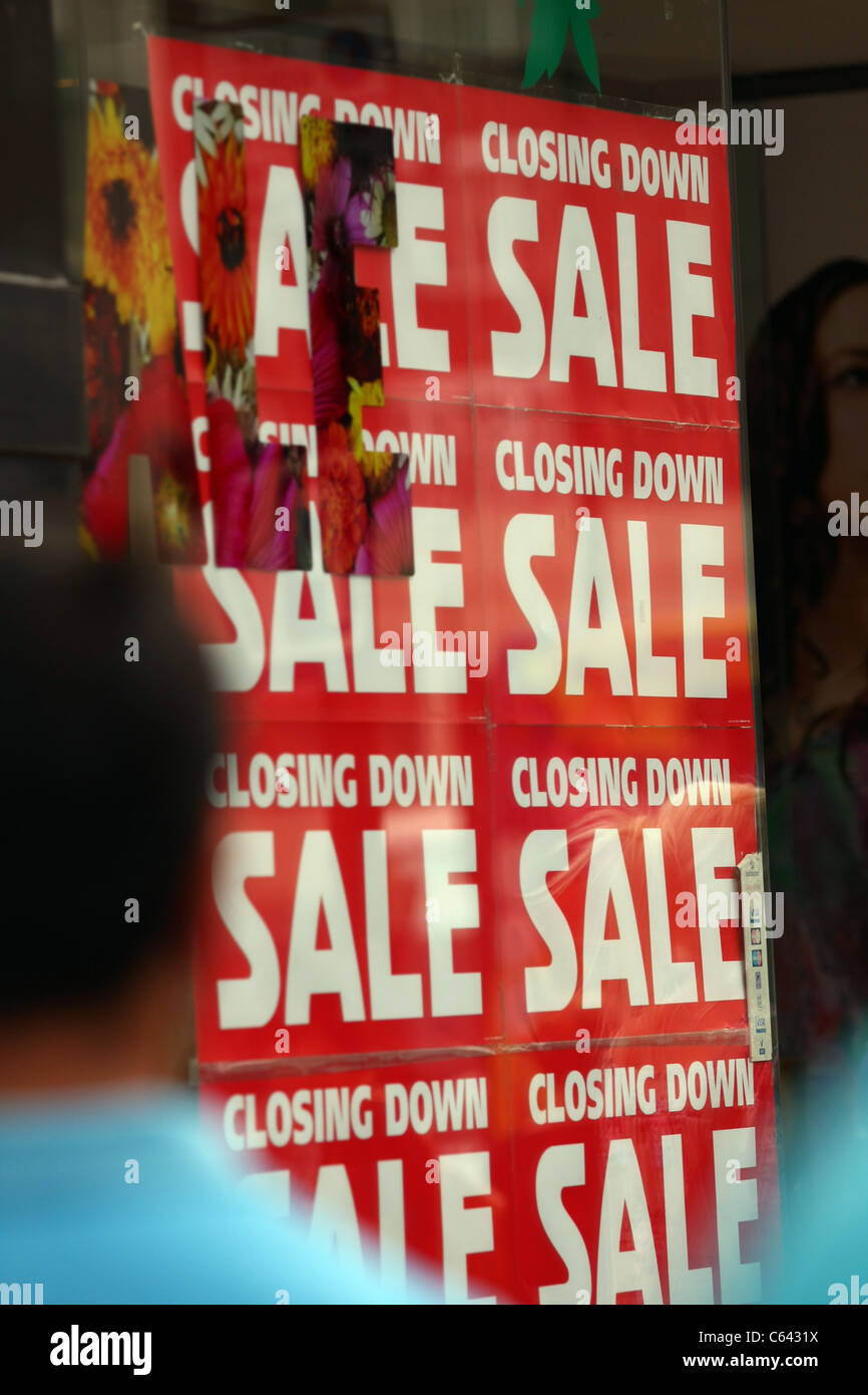 a sale sign in a shop window Stock Photo - Alamy