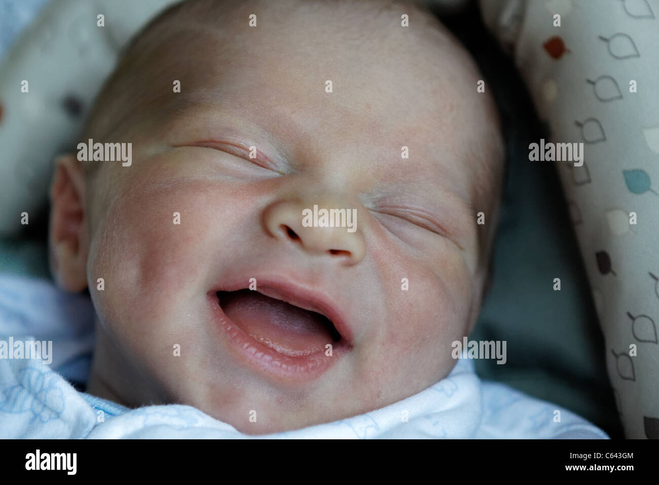 A smiling newborn Stock Photo - Alamy